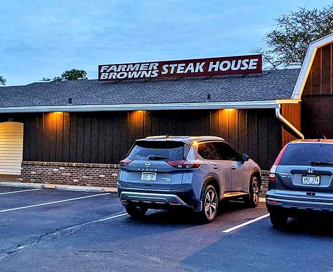 Golden lighting bathes this unassuming steakhouse in warmth, matching the hospitality you'll find inside those doors.