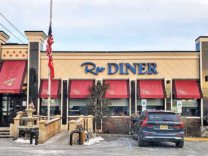 The Reo Diner's elegant awnings and classic signage hint at the timeless comfort waiting inside. Meatloaf that could make a vegetarian reconsider.