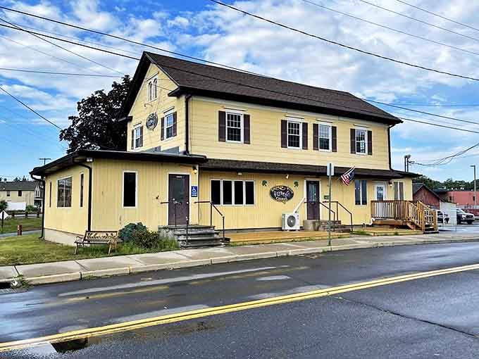 This cozy yellow house looks like where your favorite aunt would serve the world's best ribs.