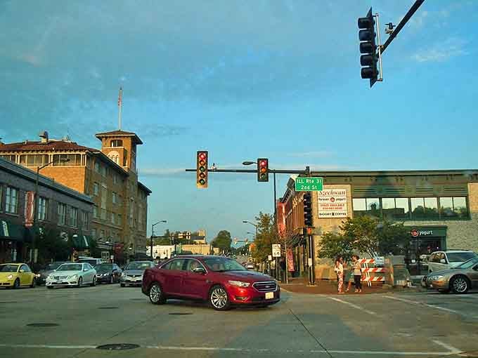 That distinctive tower watches over intersections where neighbors wave and local life unfolds in unhurried, genuine Midwestern rhythm.