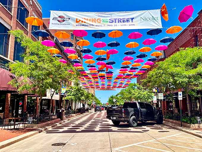 Colorful umbrellas transform downtown into an outdoor living room. In Wausau, community spirit doesn't come with a premium price tag.