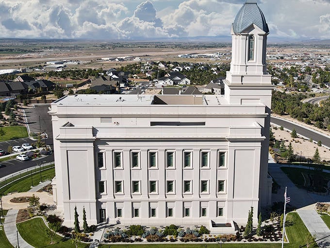 The historic Old Main building stands proudly, like a wise grandfather watching over generations of students.