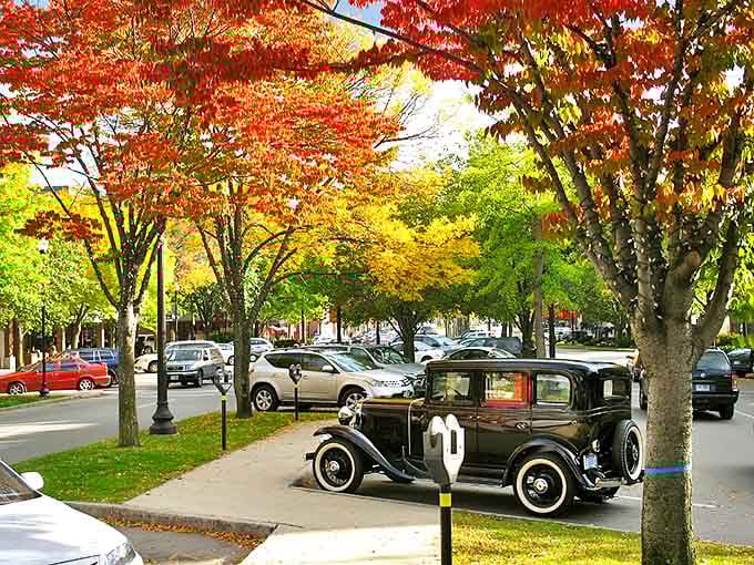 Fall in Keene transforms ordinary streets into a painter's masterpiece, where vintage cars look perfectly at home among the foliage.