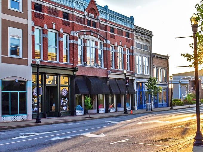 The sun casts a golden glow on Owensboro's downtown, where historic architecture meets river town vibes.