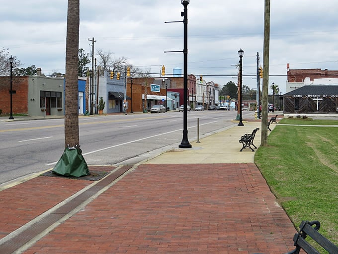 Discover the quiet charm of St. George, where brick walkways and park benches offer you a peaceful moment in town.