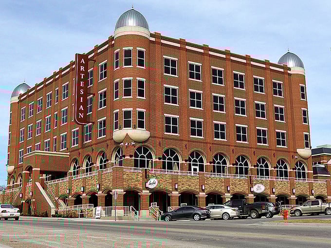 The impressive Artesian Hotel stands as Sulphur's crown jewel. This grand brick building whispers stories of the town's heyday as a mineral springs destination.