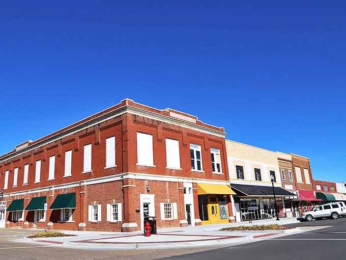 Sunlight bathes Woodward's historic downtown district, where these brick buildings have witnessed generations of Oklahoma stories.