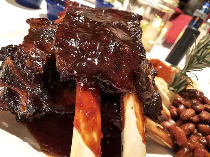 These ribs aren't just falling off the bone&mdash;they're practically jumping onto your fork, begging to be devoured alongside those hearty beans.
