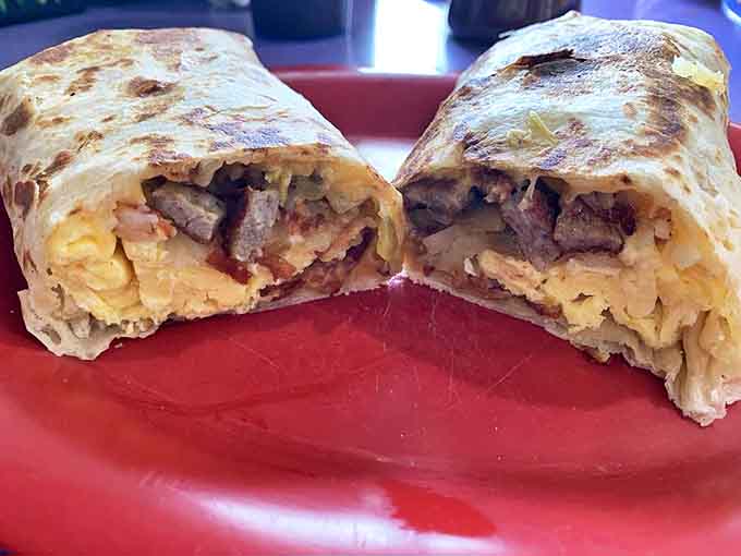 This breakfast burrito isn't just a meal, it's a structural engineering marvel &ndash; perfectly balanced layers of morning bliss wrapped in a tortilla hug.