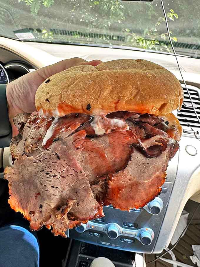 This isn't just a sandwich; it's an architectural marvel of thinly sliced beef, stacked with the precision of a meat Jenga tower.