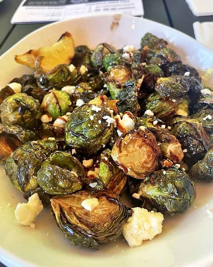 These aren't your mother's Brussels sprouts. Crispy, caramelized, and dusted with parmesan, they've undergone a transformation worthy of a vegetable makeover show.