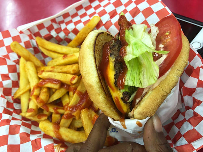 This isn't just a burger—it's edible nostalgia, complete with melty cheese, fresh veggies, and fries dusted with what can only be described as happiness powder.