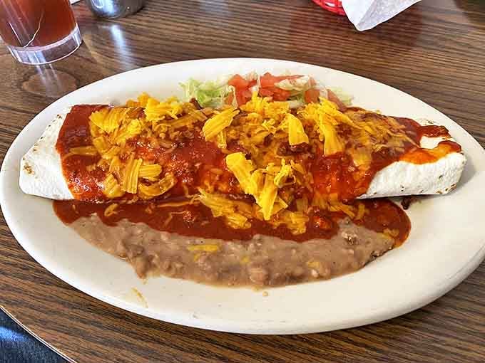 Behold the burrito in its natural habitat&mdash;smothered in red chile and cheese. Not those anemic, wrapped-in-foil imposters from chain restaurants.