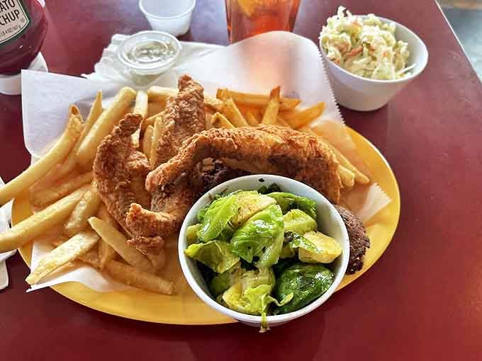This isn't just fried catfish&mdash;it's a Southern baptism by buttermilk and cornmeal, served with sides that would make any grandma proud.