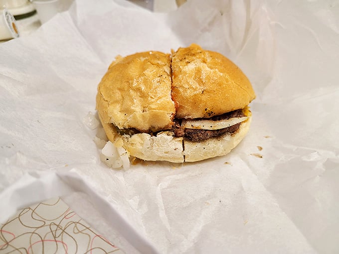 Behold the humble hamburger in its natural habitat. No pretentious toppings needed when the charcoal-kissed patty speaks this eloquently for itself.