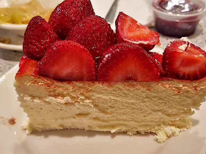 This strawberry-crowned slice isn't just dessert—it's a sweet celebration that makes any ordinary Tuesday feel like your birthday.