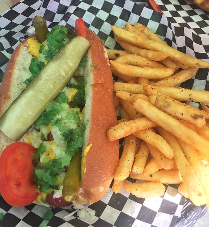 The Chicago Dog arrives dressed for success with all the proper fixings &ndash; a Windy City classic that would make any Chicagoan nod in approval.
