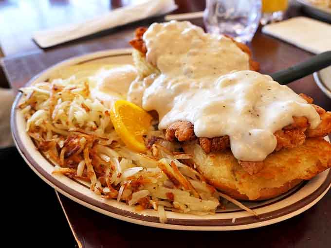 Country fried steak smothered in gravy that could make a vegetarian question their life choices. Those hash browns aren't playing around either.