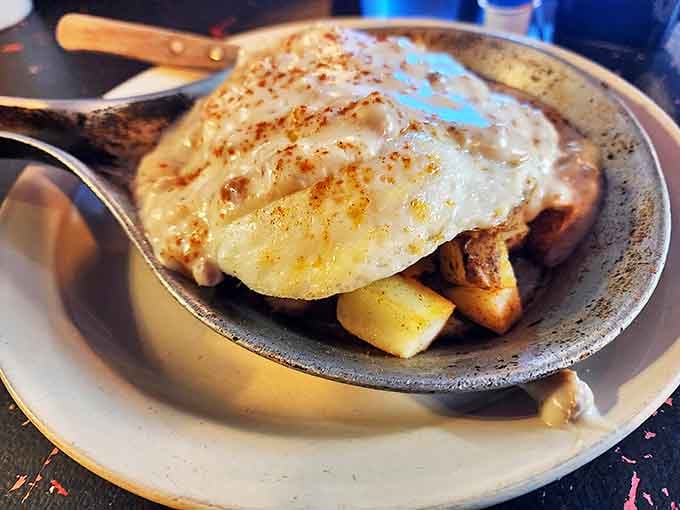 Breakfast alchemy at its finest&mdash;eggs and potatoes sharing a skillet in perfect harmony. The kind of meal that makes you forget all your troubles.