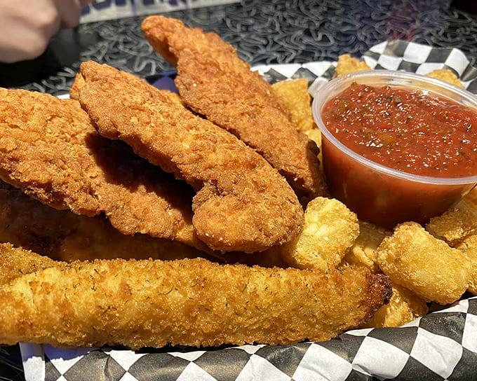 Golden-fried chicken tenders and cheese sticks: proof that even in the space age, we still crave the simple pleasure of perfectly fried comfort food.