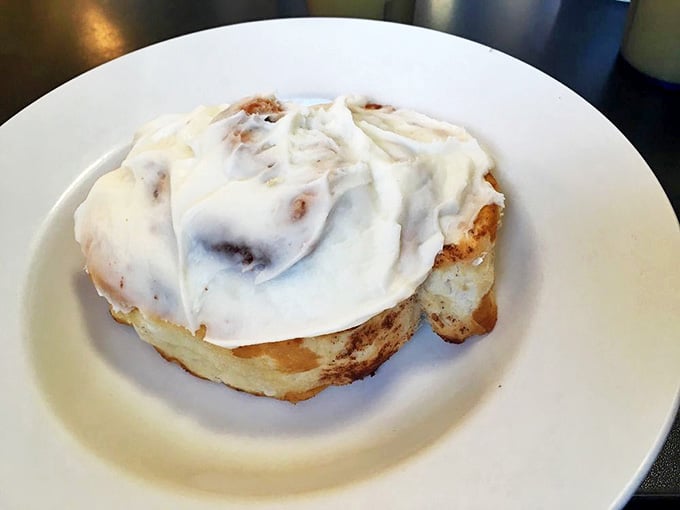 This cinnamon roll isn't just breakfast &ndash; it's a pillowy spiral of joy topped with frosting that melts with the urgency of a snowflake in July.