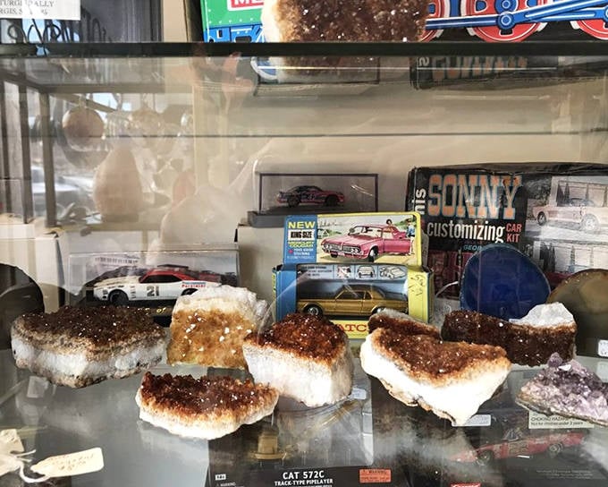 Nature's artwork meets human ingenuity&mdash;geodes and model cars sharing space in the ultimate cabinet of curiosities.