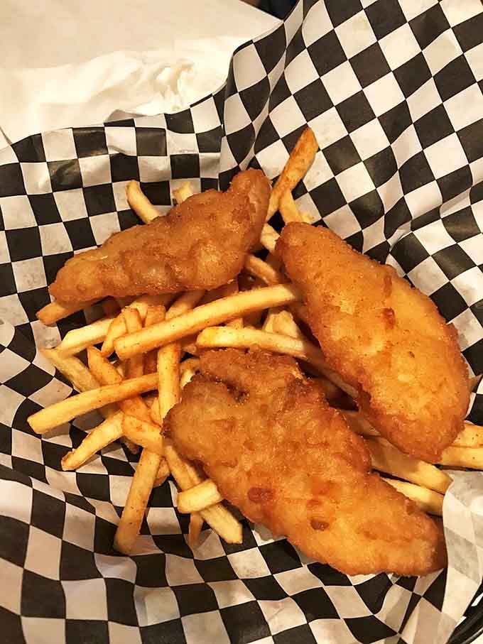 Fish and chips that would make a Brit homesick. Golden, crispy perfection that proves you don't need an ocean view to nail seafood classics.