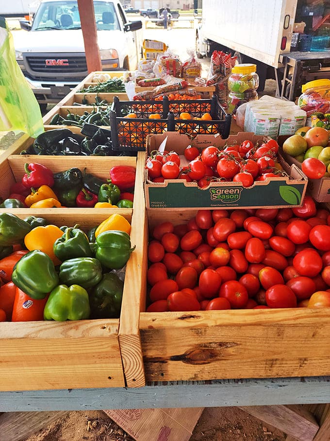 Nature's color palette on full display. These farm-fresh peppers and tomatoes make grocery store produce look like it's been through witness protection.