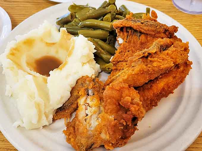Fried chicken so perfectly golden it belongs in the Southern Food Hall of Fame, paired with sides that know their supporting role but still steal scenes.