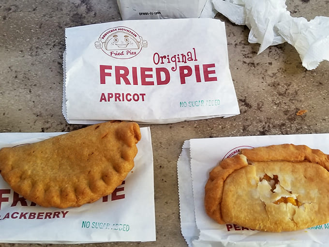Three pies, three wrappers, three opportunities for happiness. The crimped edges seal in flavor while promising a moment of deep-fried bliss.