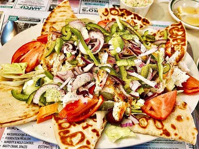 This Greek salad isn't just a meal, it's a Mediterranean vacation on a plate. Fresh, vibrant, and large enough to have its own zip code.