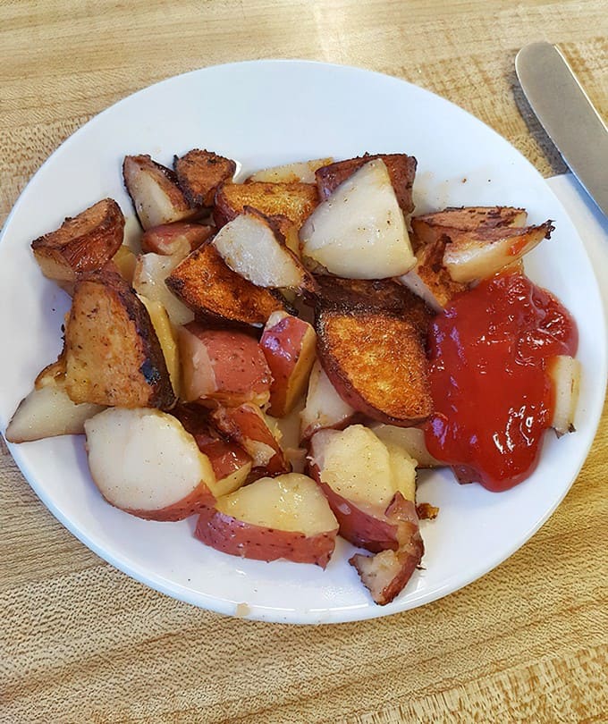 These aren't just home fries; they're potato perfection &ndash; crispy, seasoned nuggets of comfort that make ketchup an enhancement, not a necessity.