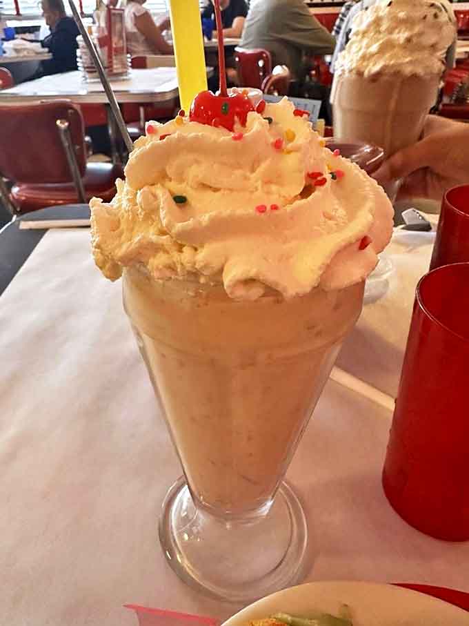 The milkshakes arrive with architectural ambition &ndash; skyscrapers of whipped cream that deserve their own building permit.