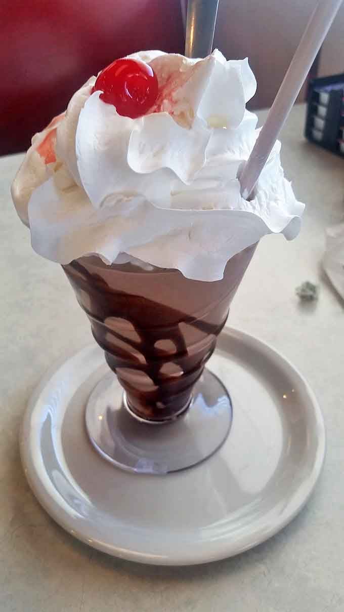 This isn't just a chocolate shake&mdash;it's a tower of creamy indulgence topped with enough whipped cream to make Elvis say "Thank you, thank you very much."