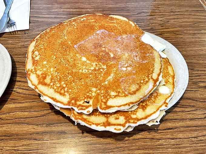 Pancakes so perfectly golden and fluffy they could make IHOP executives weep with envy. Breakfast doesn't get more honest than this.