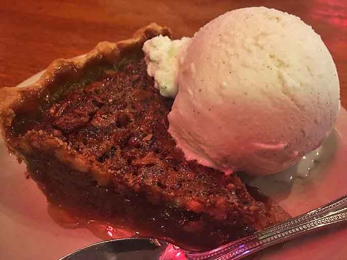 Pecan pie that strikes the perfect balance between sweet and nutty. That scoop of vanilla ice cream isn't optional&mdash;it's an essential companion to this Southern classic.