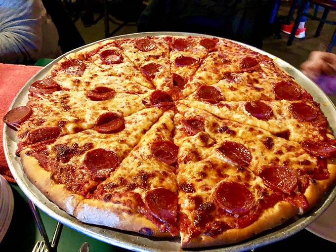 The pepperoni pizza that launched a thousand cravings—perfectly spaced discs of spicy goodness on a canvas of melted cheese and tangy sauce.