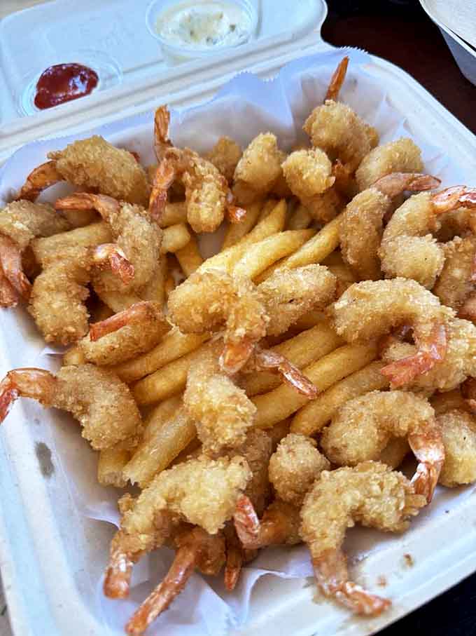 Popcorn shrimp that actually taste like shrimp &ndash; what a concept! Golden-fried treasures nestled among perfectly cooked fries &ndash; the seafood equivalent of winning the lottery.