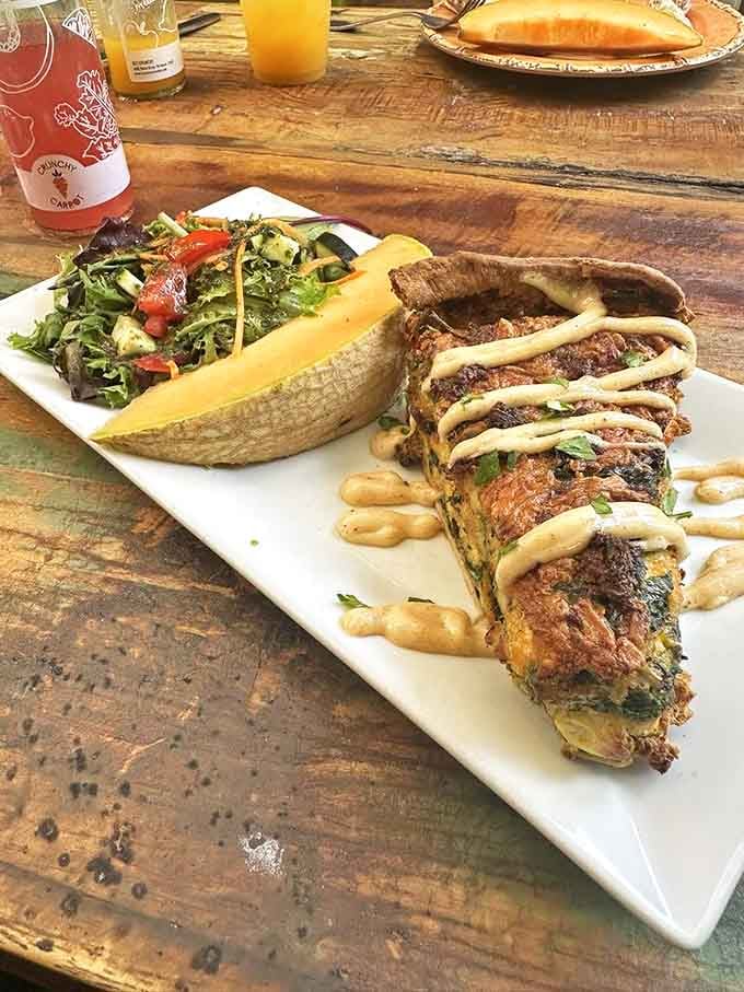 Quiche and salad: the lunch combo that says "I'm being responsible" while still feeling utterly indulgent. That crust deserves its own fan club.