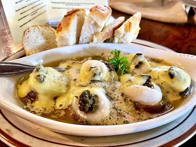 These scallops swim in a buttery bath so divine you'll forget you're eating something that once wore its home on its back.