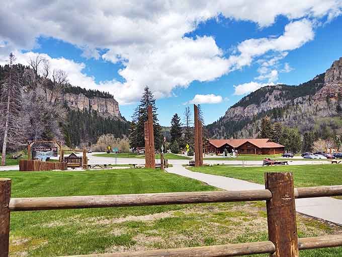 The visitor area nestled between canyon walls offers a moment to breathe. Like finding an oasis where the coffee is hot and the views are cool.