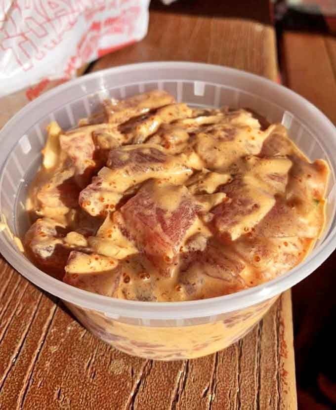 This spicy tuna doesn't need fancy plating or garnish&mdash;just honest-to-goodness flavor that makes your mouth do the hula. Simple container, complex satisfaction.