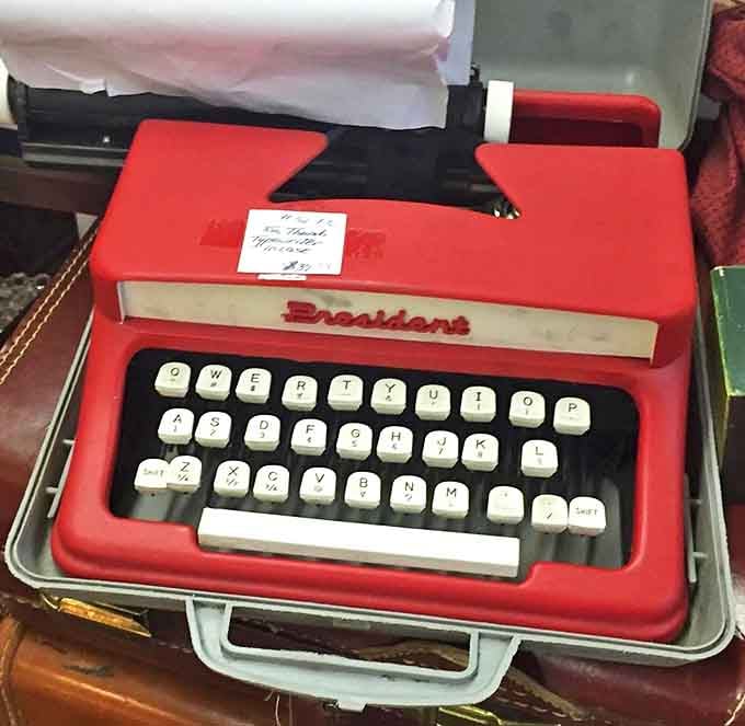 A cherry-red President typewriter awaits its next great American novel. In the age of delete buttons, there's something gloriously committed about a typewriter key strike.