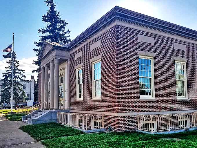 The stately brick post office stands as Carrington's architectural crown jewel, its columns and cornices a testament to when public buildings inspired civic pride.
