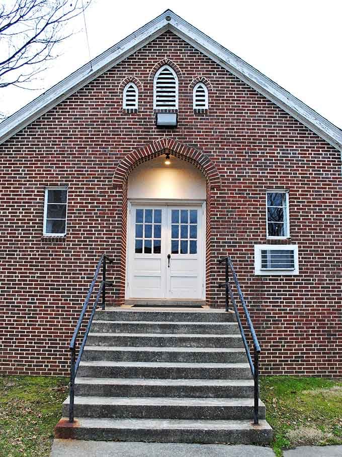 This charming brick church with its perfect symmetry reminds us that architectural beauty doesn't require a cathedral's budget.