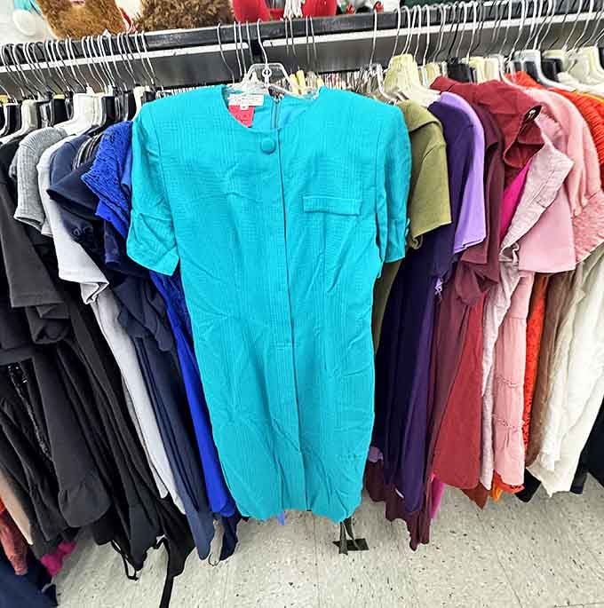 The women's apparel section offers a time-traveling fashion experience where vintage meets value in a kaleidoscope of textures.