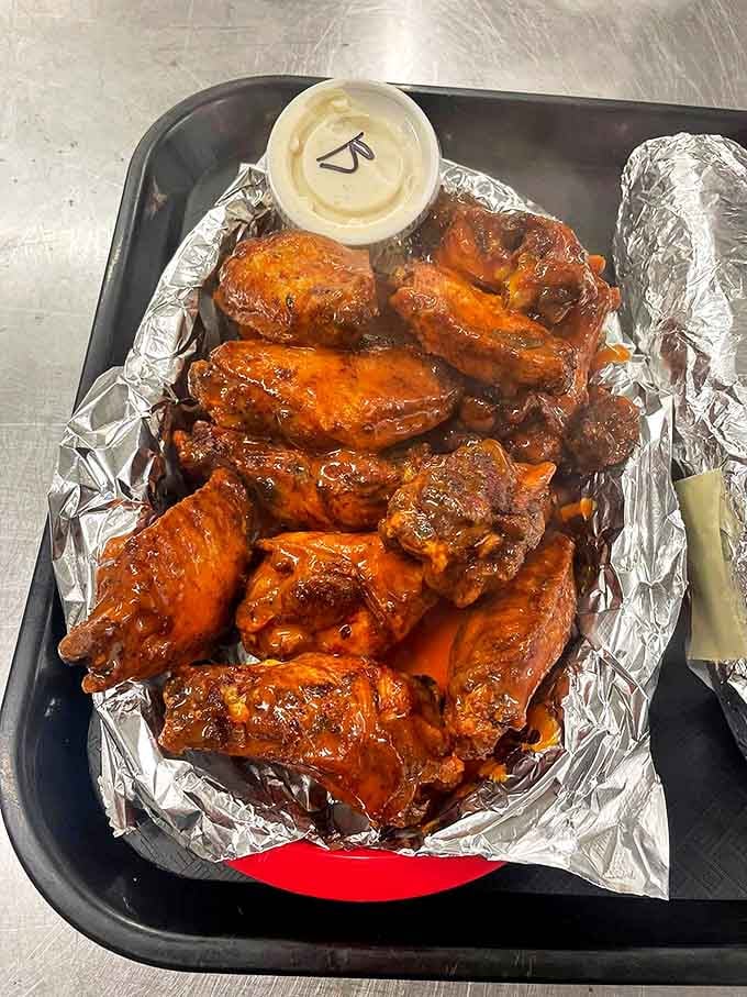 These wings aren't just coated in sauce&mdash;they're baptized in it, glistening with a sticky-sweet glaze that promises to test the limits of your napkin supply.
