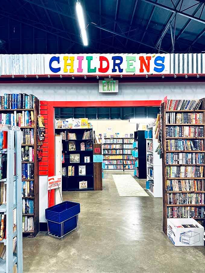 The children's section announces itself with playful letters, a gateway to worlds where wild things roam and caterpillars get very, very hungry.
