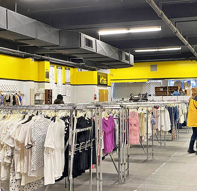 Bright yellow walls frame racks of possibility. That pink dress might have attended a wedding before, but it's ready for your next celebration.