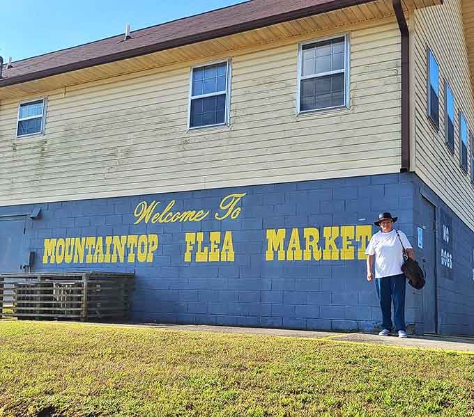 The iconic blue and yellow welcome sign stands as a landmark for generations of Alabama families seeking Sunday adventure.